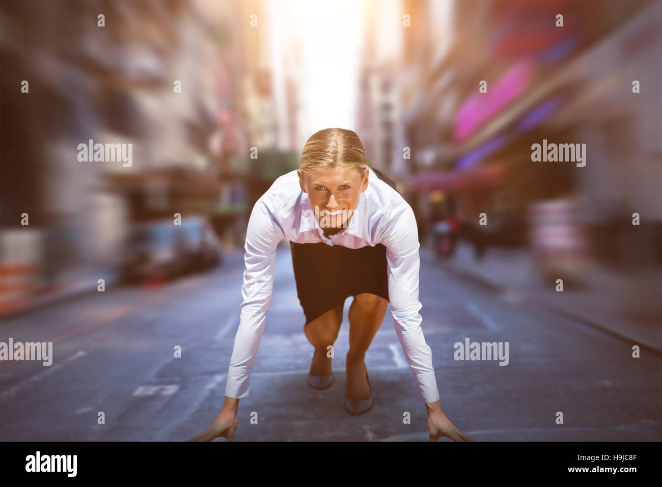 Starting blocks in suit hi-res stock photography and images - Alamy