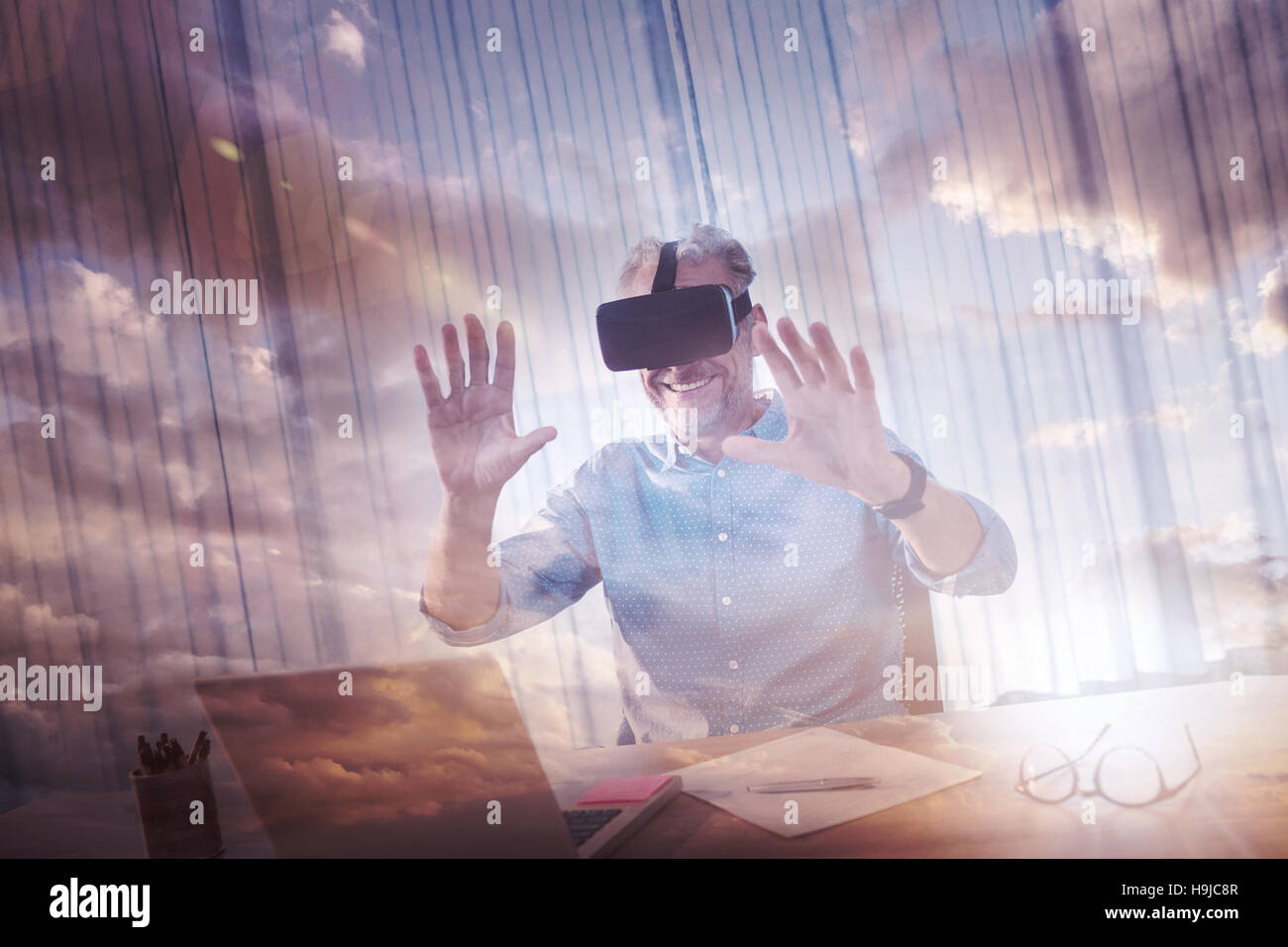 Businessman using an oculus Stock Photo - Alamy