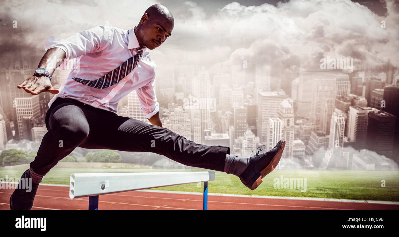 Man jumping hurdle hi-res stock photography and images - Alamy