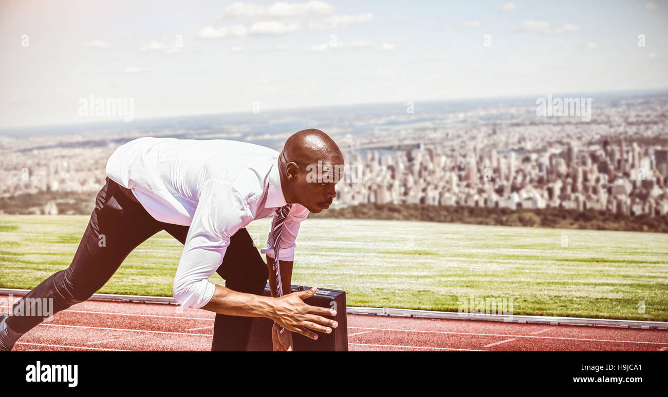 Starting blocks in suit hi-res stock photography and images - Alamy