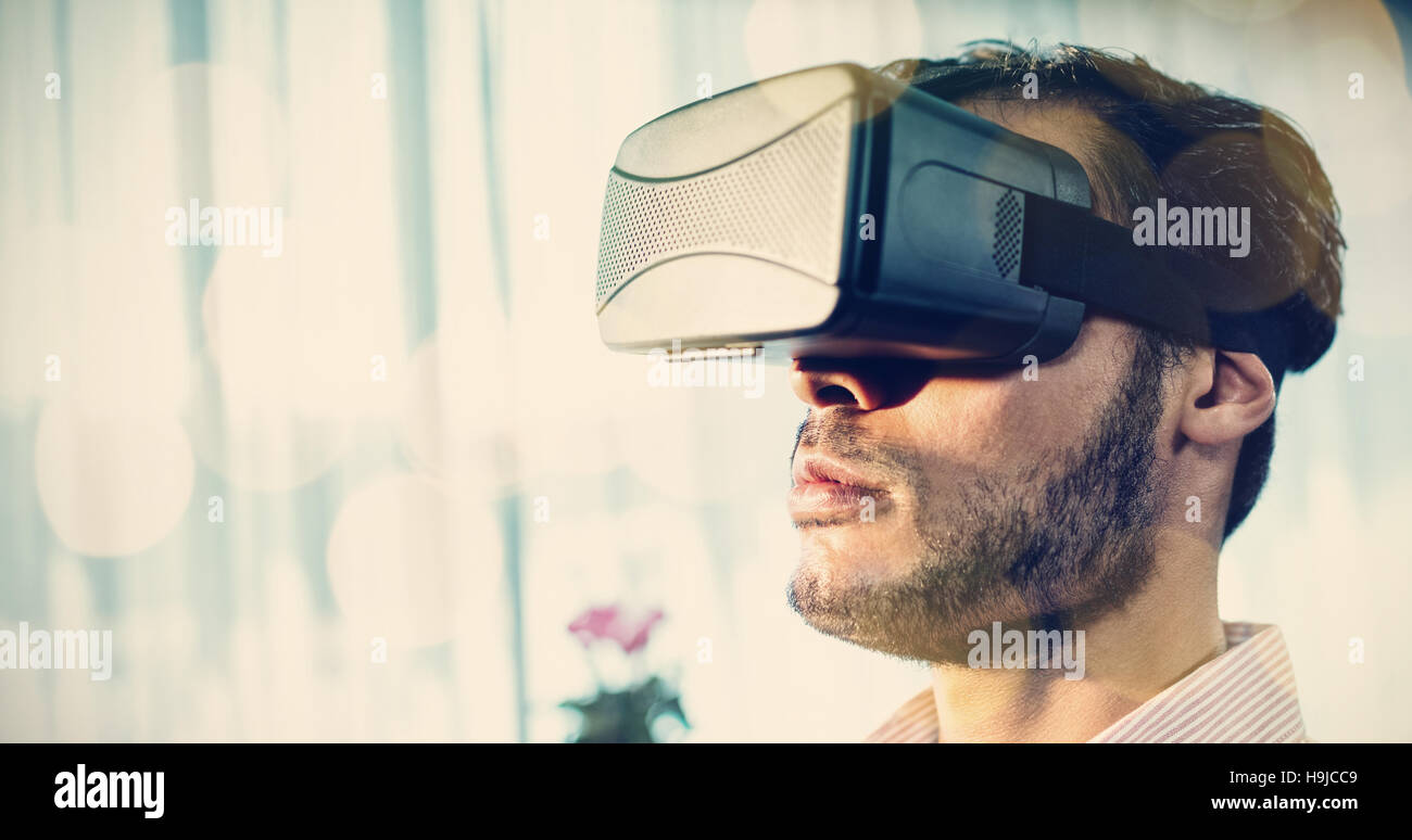 Businessman using an oculus Stock Photo - Alamy