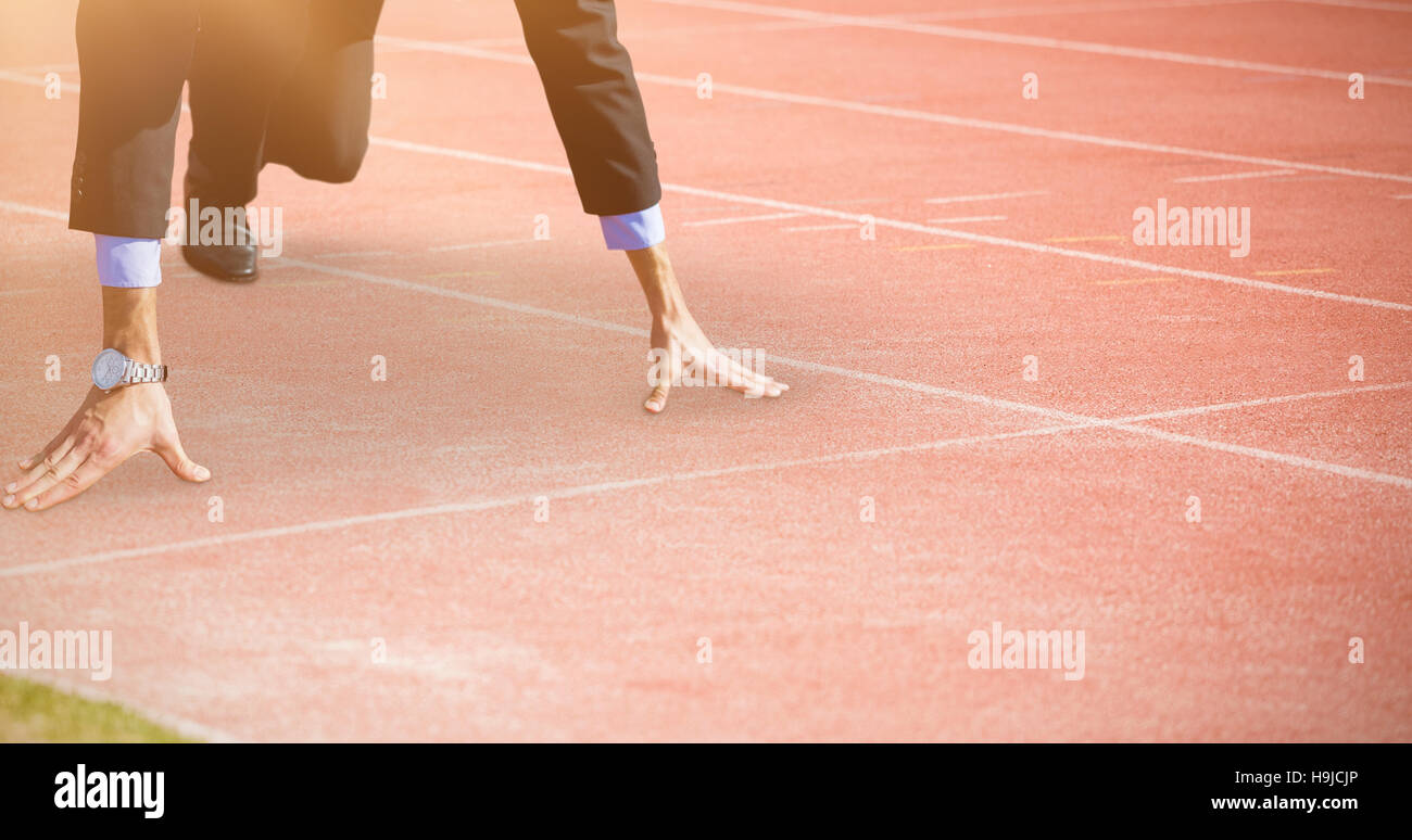 Starting blocks in suit hi-res stock photography and images - Alamy