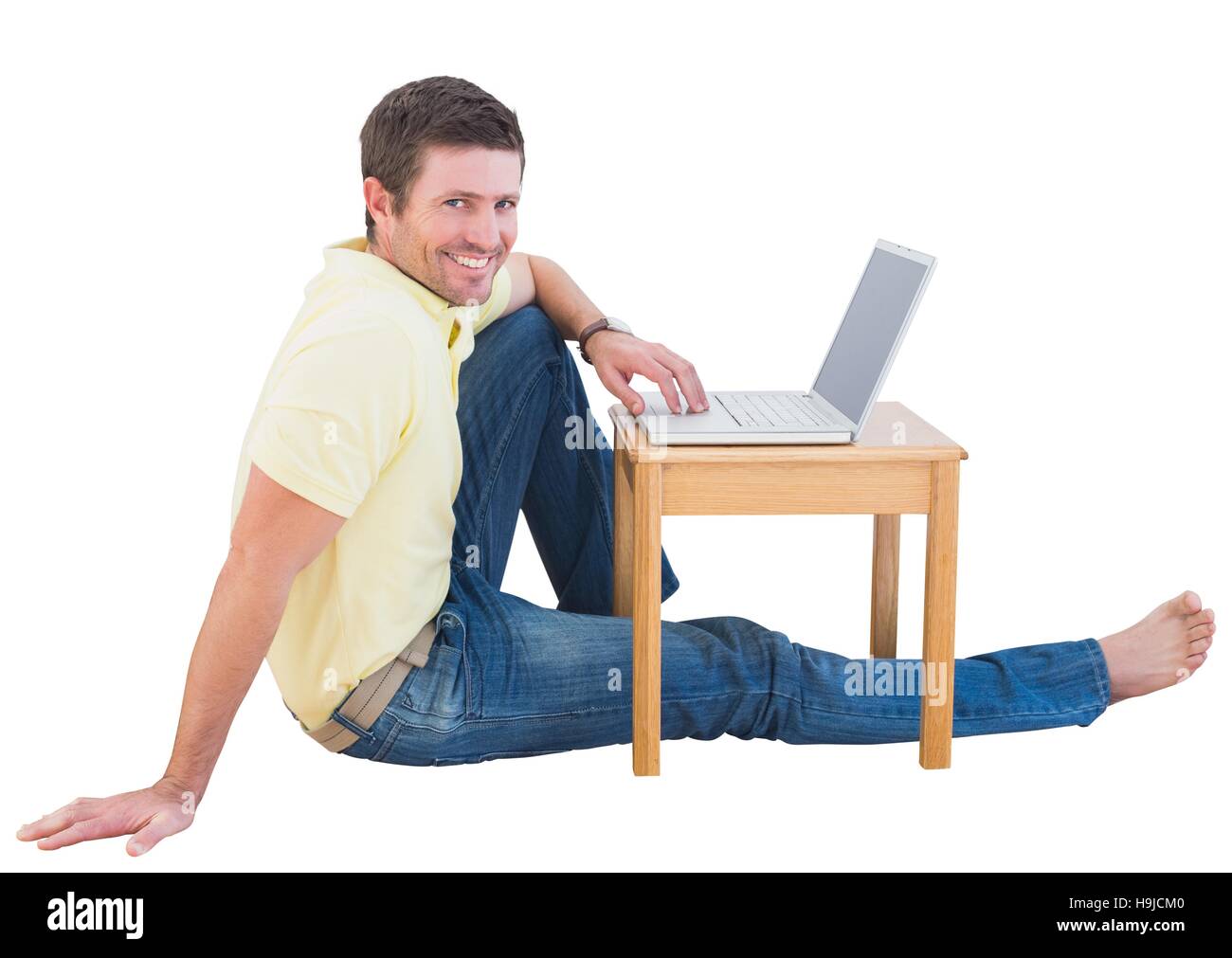 Man looking at laptop Cut Out Stock Images & Pictures - Alamy