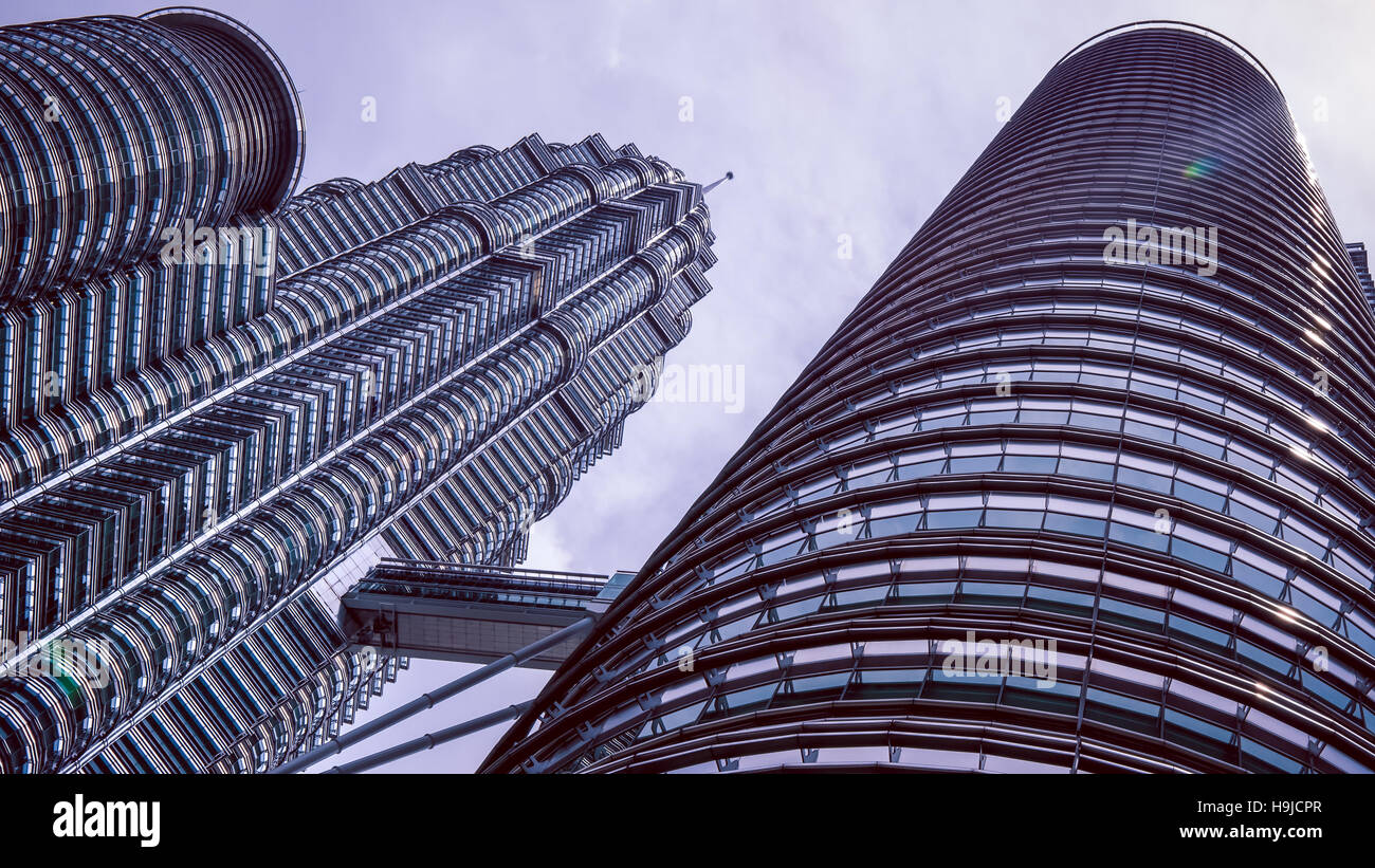 Close up dynamic perspective view from the bottom upwards on Petronas ...