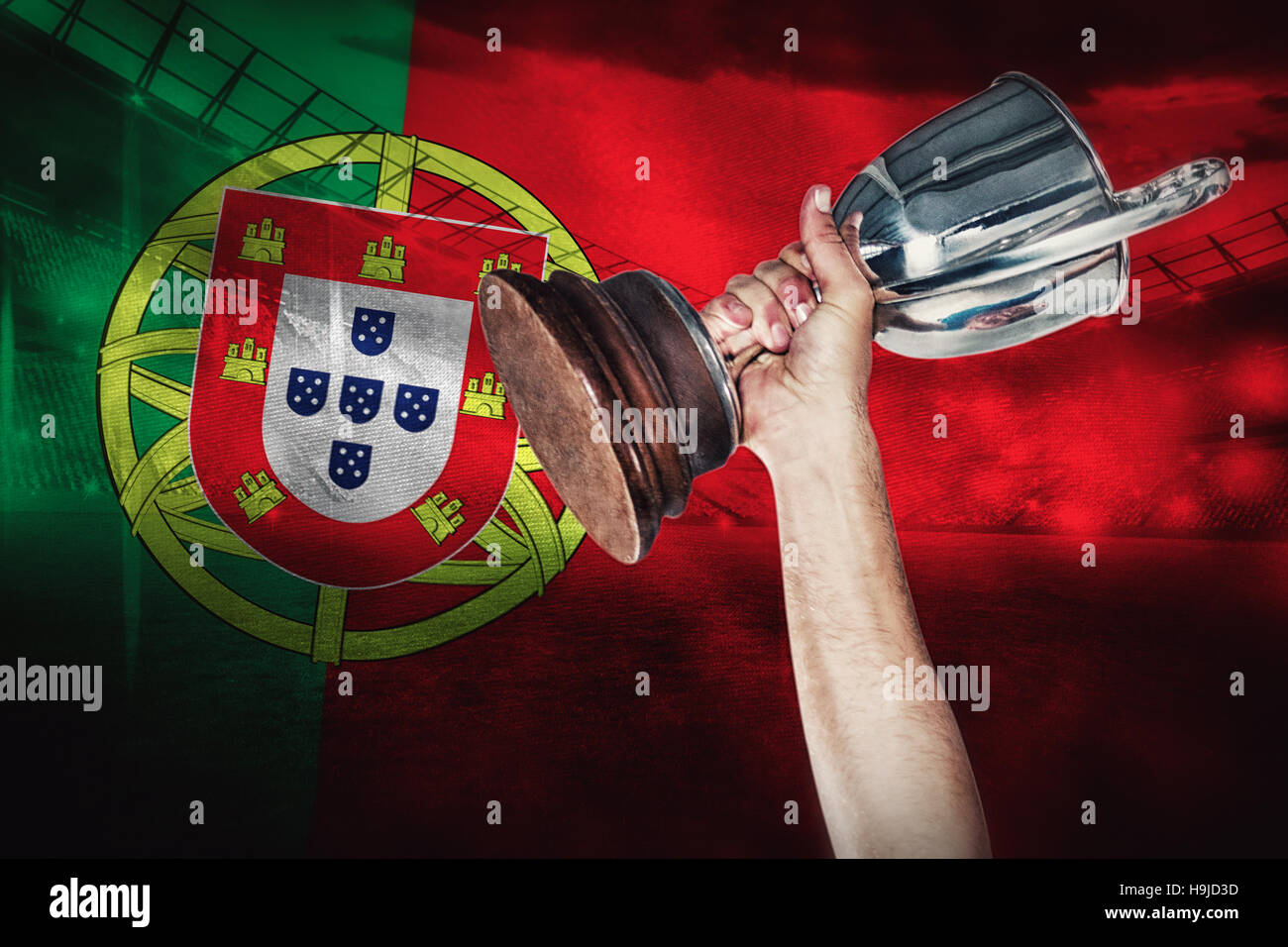Composite image of happy rugby player holding trophy Stock Photo - Alamy