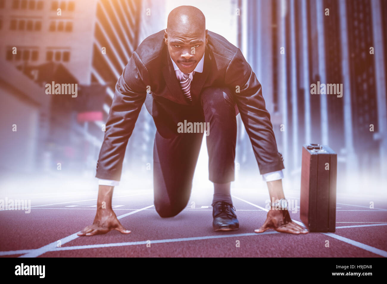 Starting blocks in suit hi-res stock photography and images - Alamy