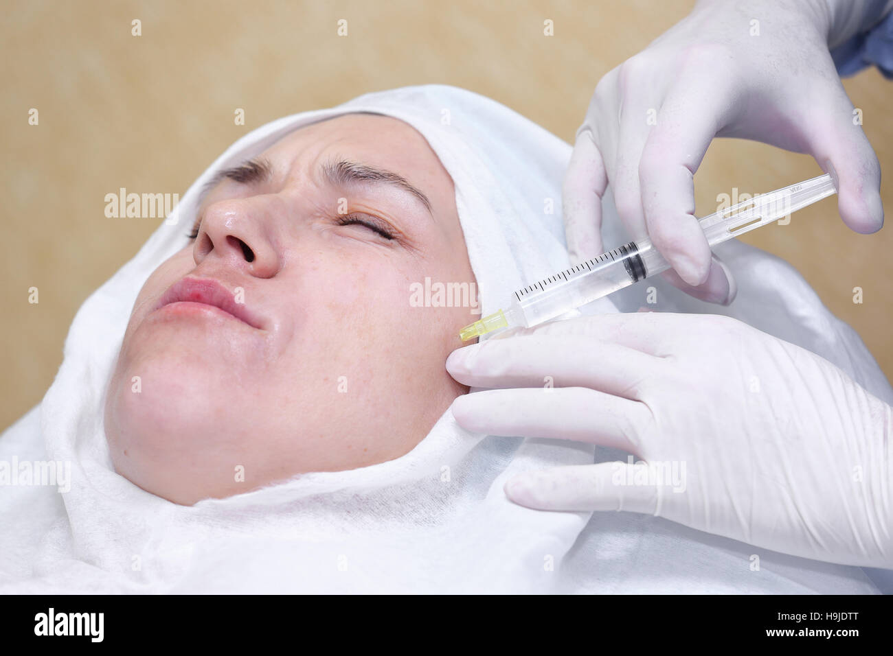 Cosmetic treatment with anti-age mixture injection in a clinic Stock ...