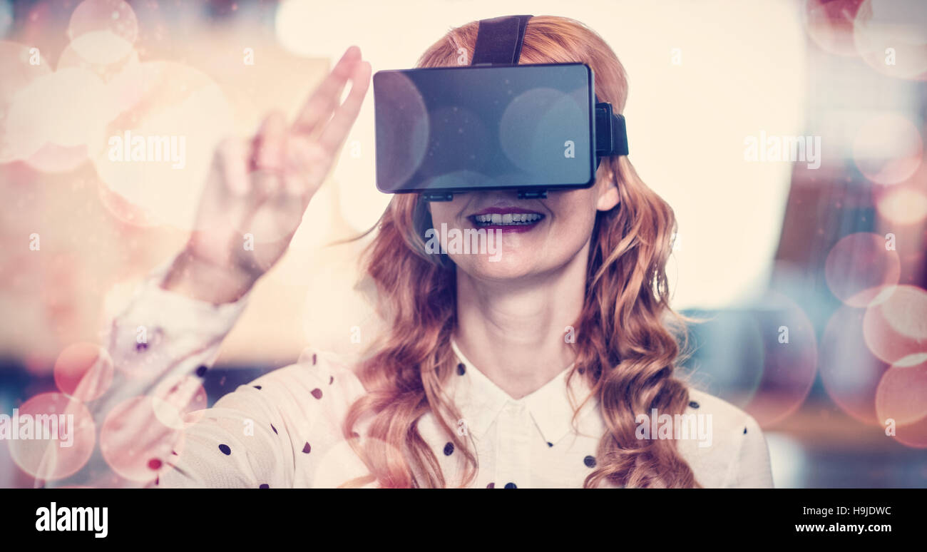 Woman wearing virtual reality glass Stock Photo - Alamy