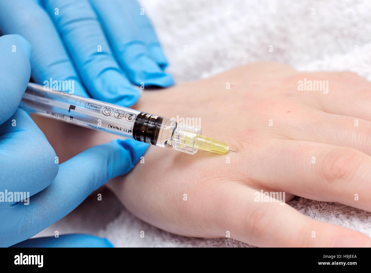 Hand injection hi-res stock photography and images - Alamy