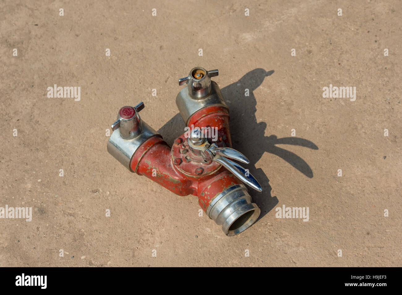 Water hose connected to hydrant during firefighting operation Stock ...