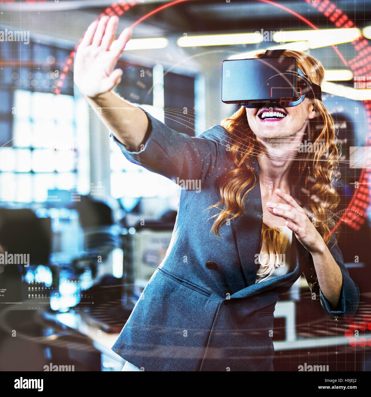 Cheerful woman using virtual reality simulator Stock Photo - Alamy