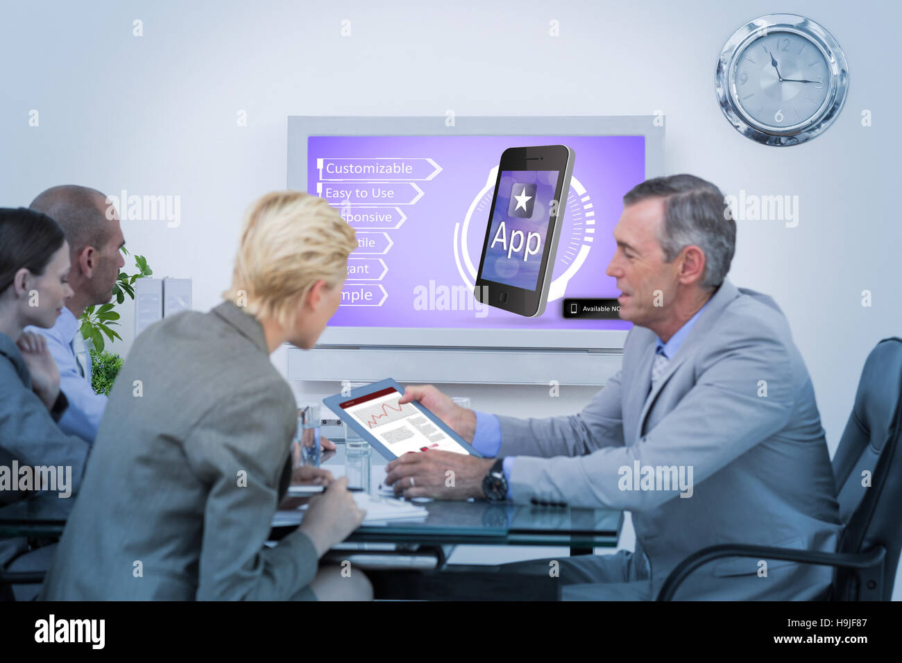 Composite image of colleagues speaking about work Stock Photo - Alamy