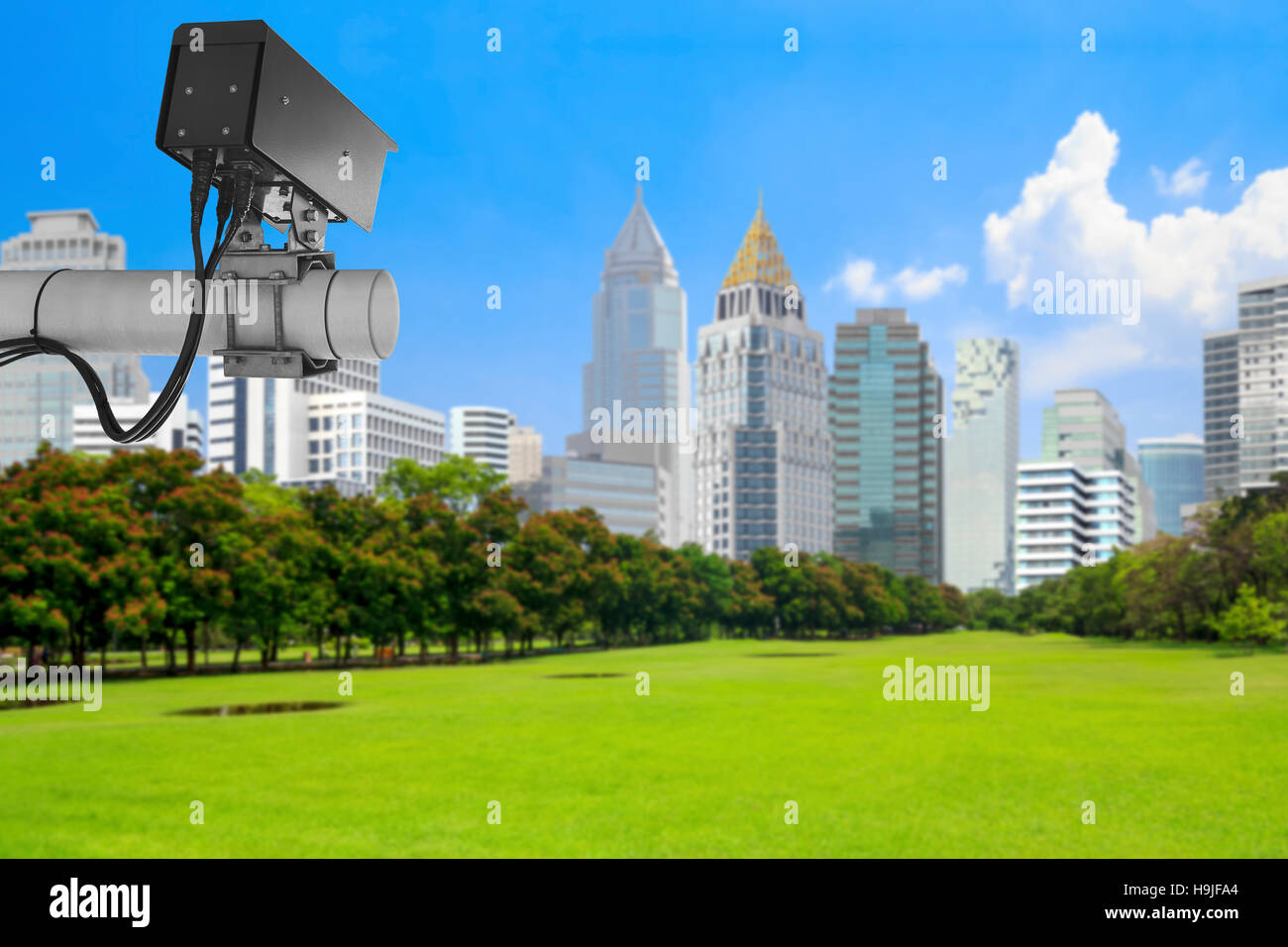 CCTV Security Camera or surveillance and view of Park scenery with ...