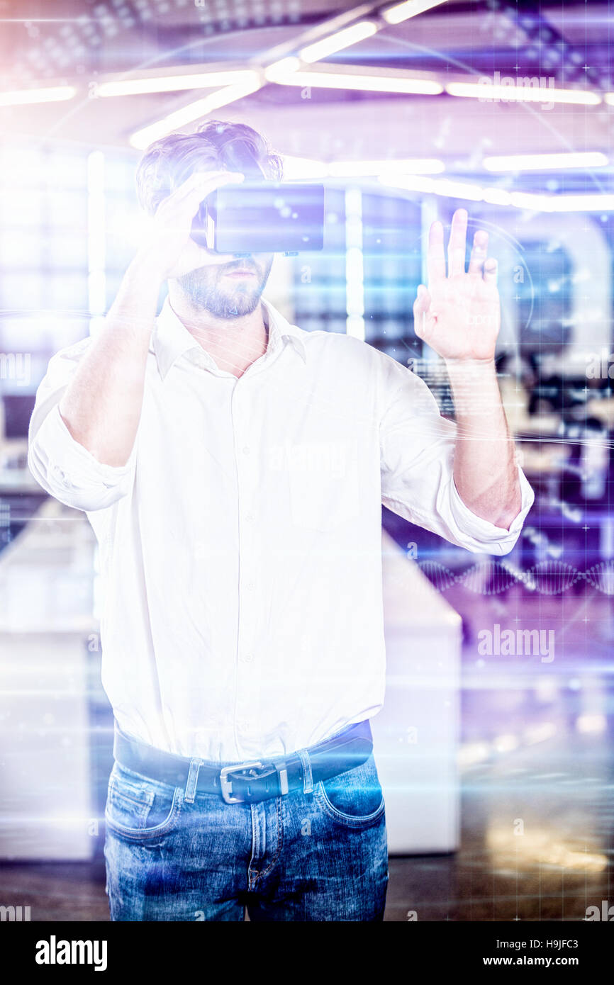 Businessman using virtual reality simulator Stock Photo - Alamy
