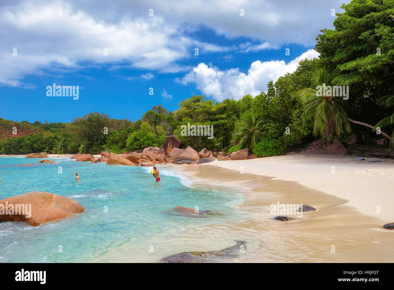 Granite Rocks On Anse Lazio Beach At Praslin Island Seychelles Stock granite-rocks-on-anse-lazio-beach-at-praslin-island-seychelles-stock