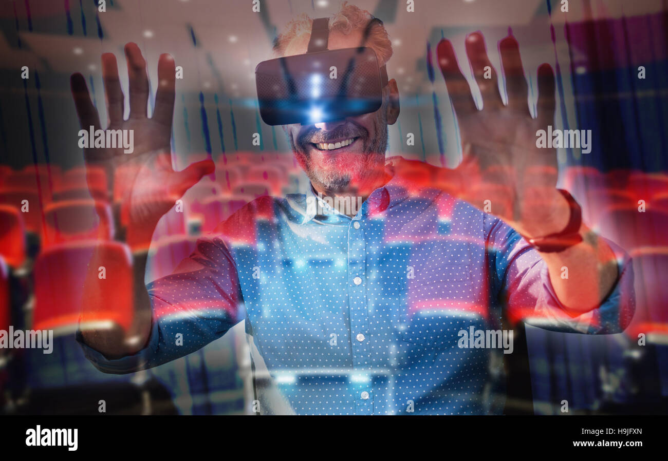 Composite image of businessman using an oculus Stock Photo - Alamy