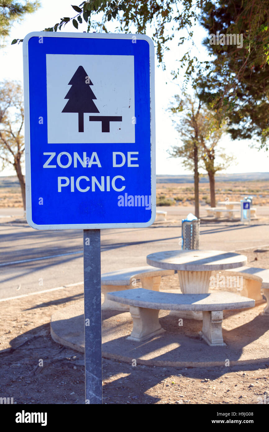 Roar sign Picnic Zone near table on background with road Stock Photo ...