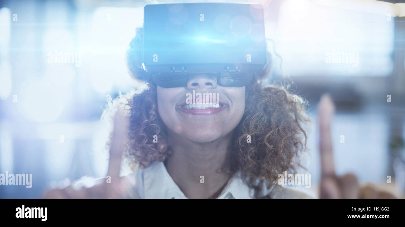 Woman wearing virtual reality glass Stock Photo - Alamy