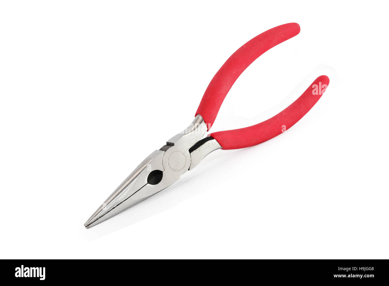 Combination pliers with red handles on white background. Clipping path ...