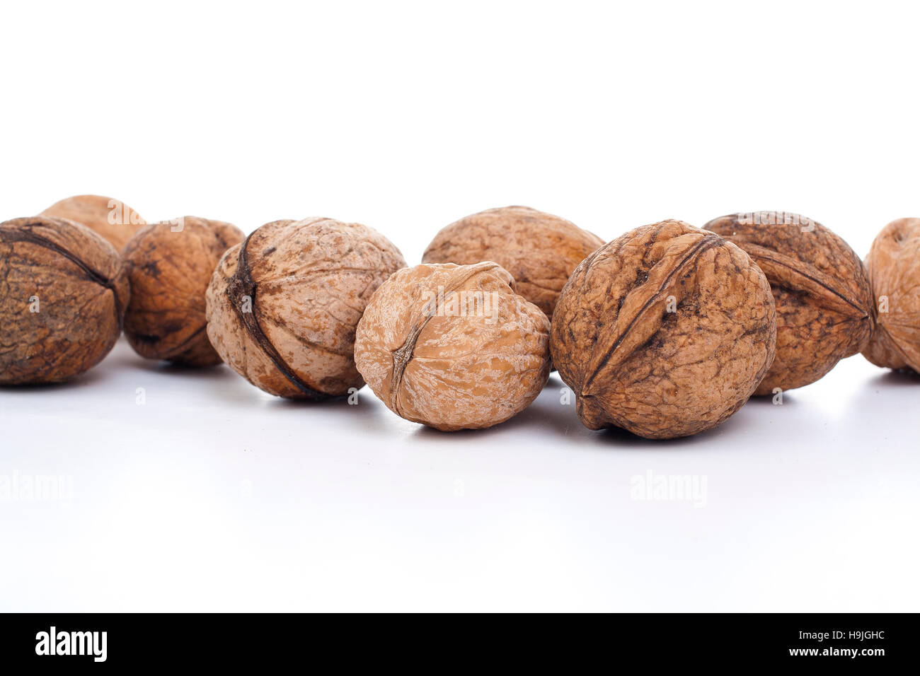 Walnuts on white background. Walnut texture.Background, brown ...