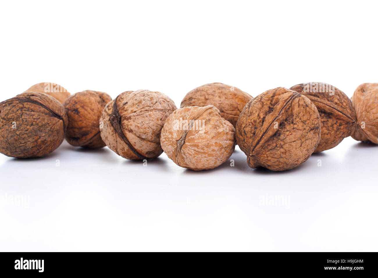 Walnuts on white background. Walnut texture.Background, brown ...