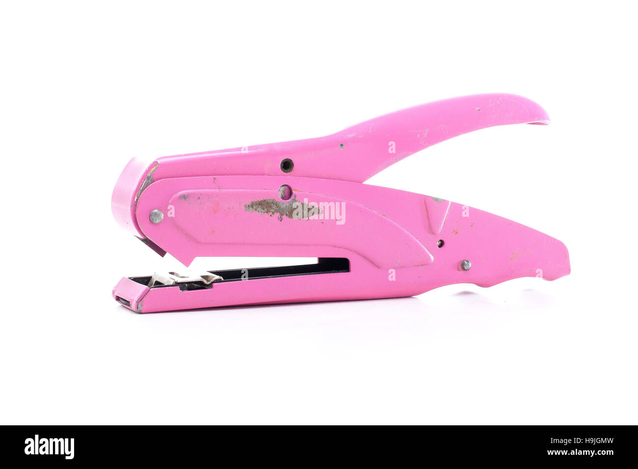 Pink stapler business tool. Stapler can illustrate any business concept ...