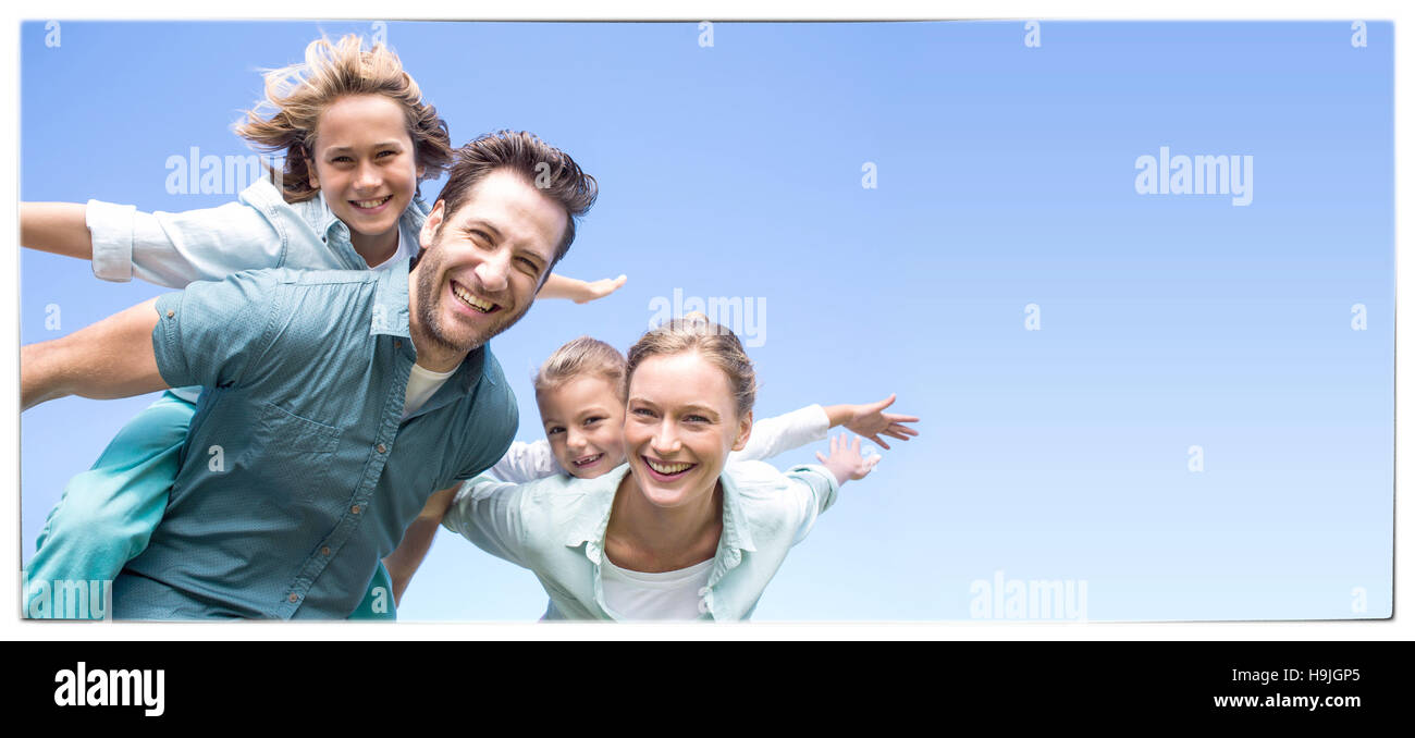 Happy parents with their children Stock Photo - Alamy