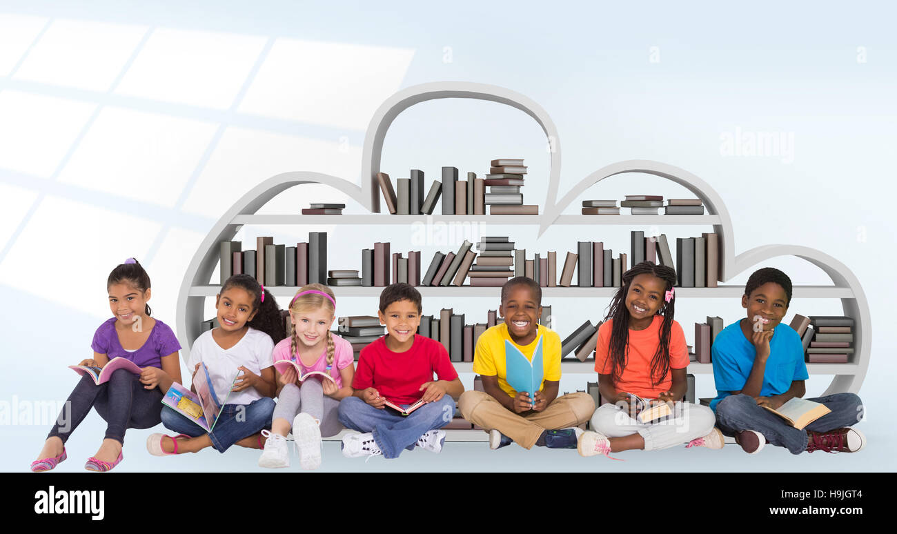 Composite image of elementary pupils reading books Stock Photo - Alamy