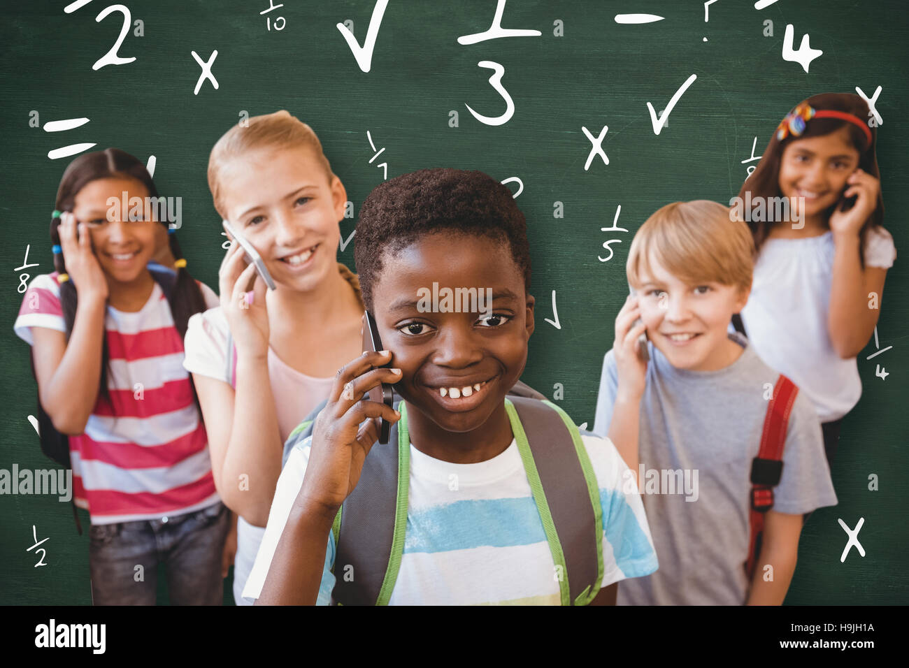 School kids using mobile phone hi-res stock photography and images - Alamy