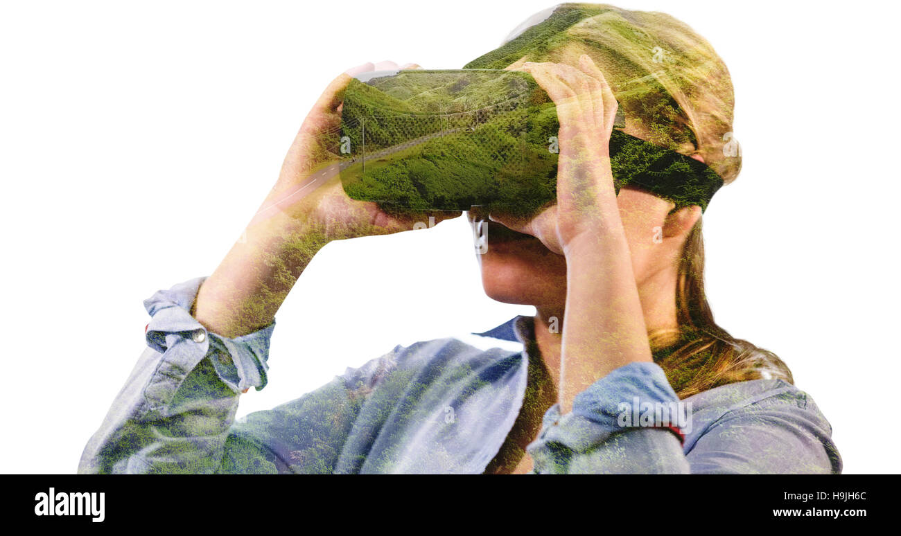 Composite image of woman using an oculus Stock Photo - Alamy