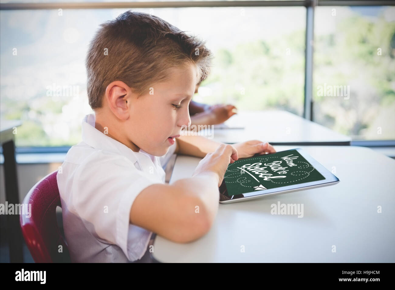 Child back of head computer hi-res stock photography and images - Alamy