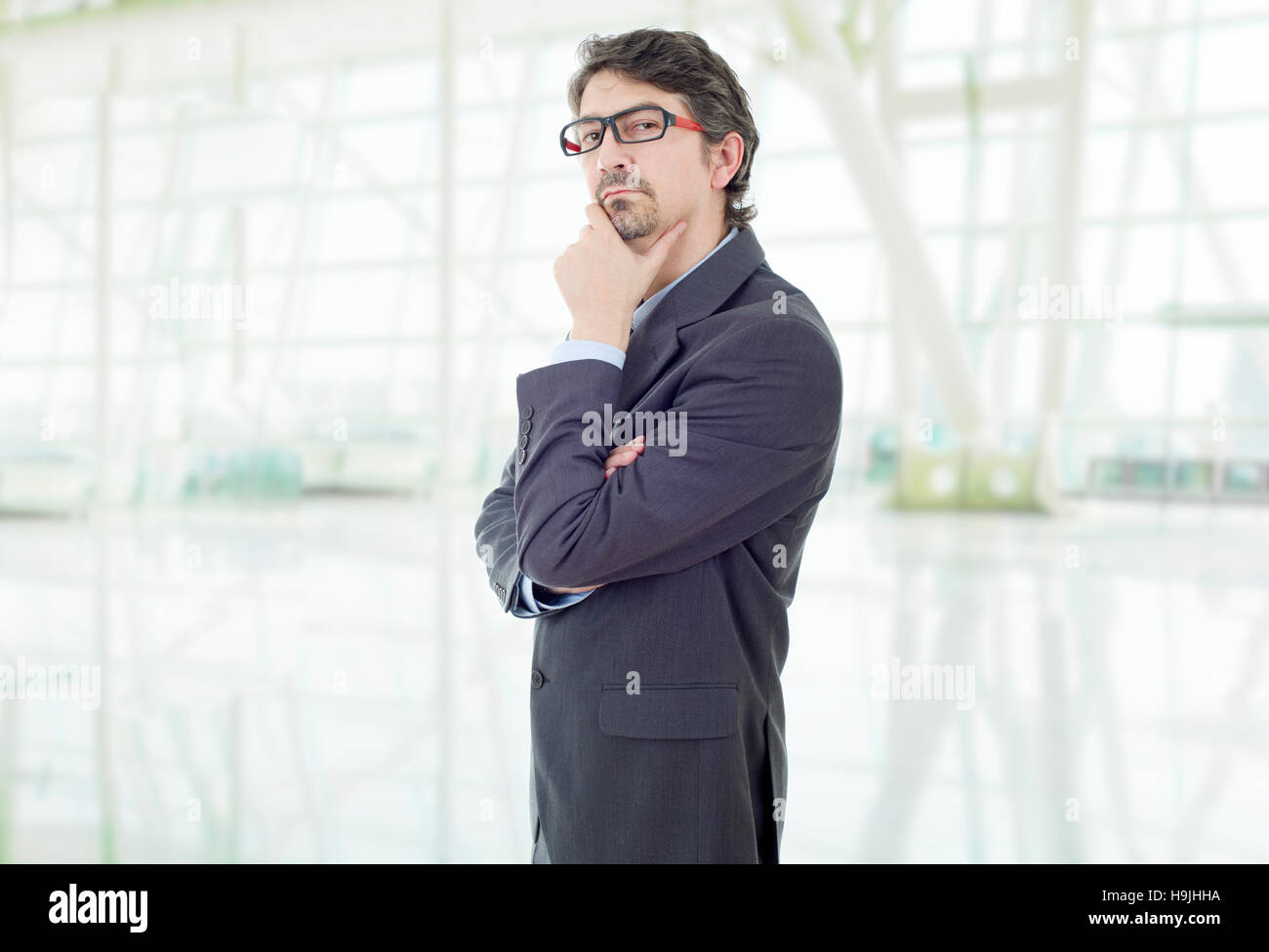 young business man thinking, at the office Stock Photo - Alamy