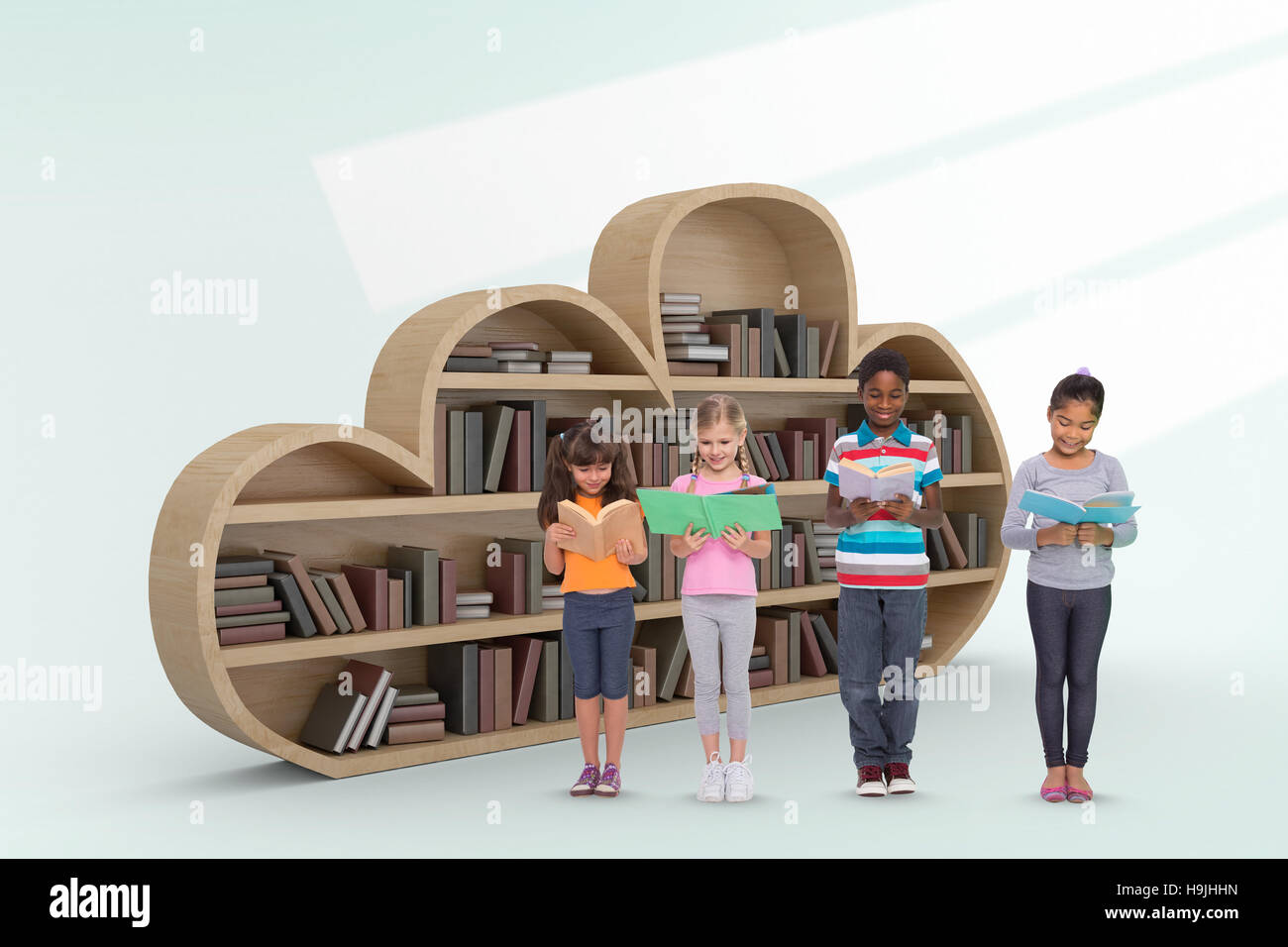 Composite image of elementary pupils reading Stock Photo - Alamy