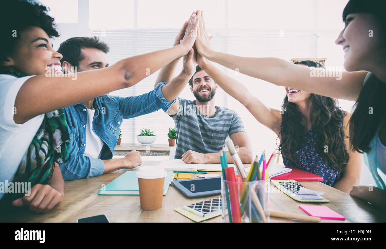 Successful team working together hi-res stock photography and images ...