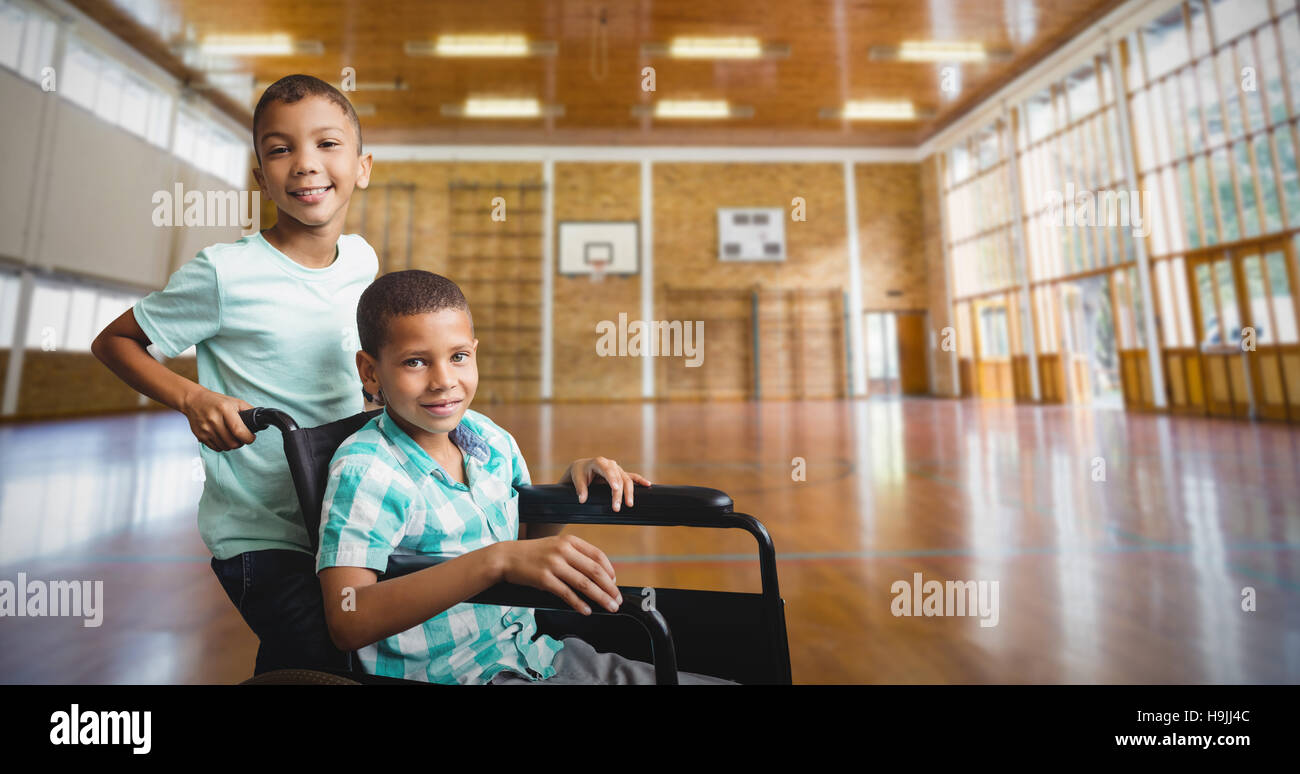 Boy pushing boy wheelchair hi-res stock photography and images - Alamy