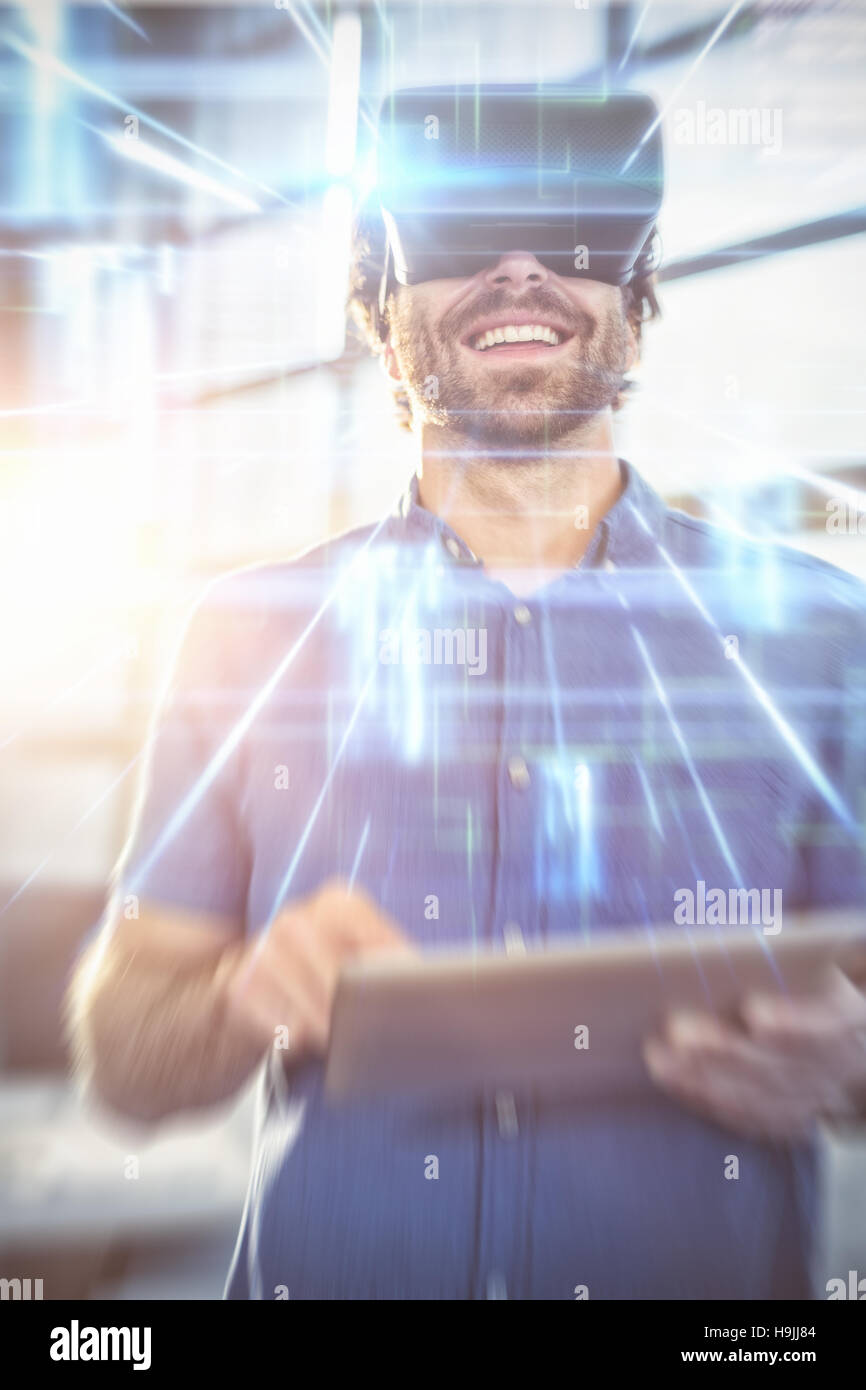 Composite image of blue lines next to screens and text Stock Photo - Alamy