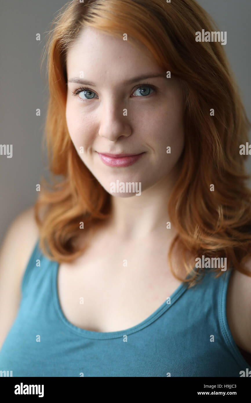 Head short of a very attractive young woman with red hair and stunning ...