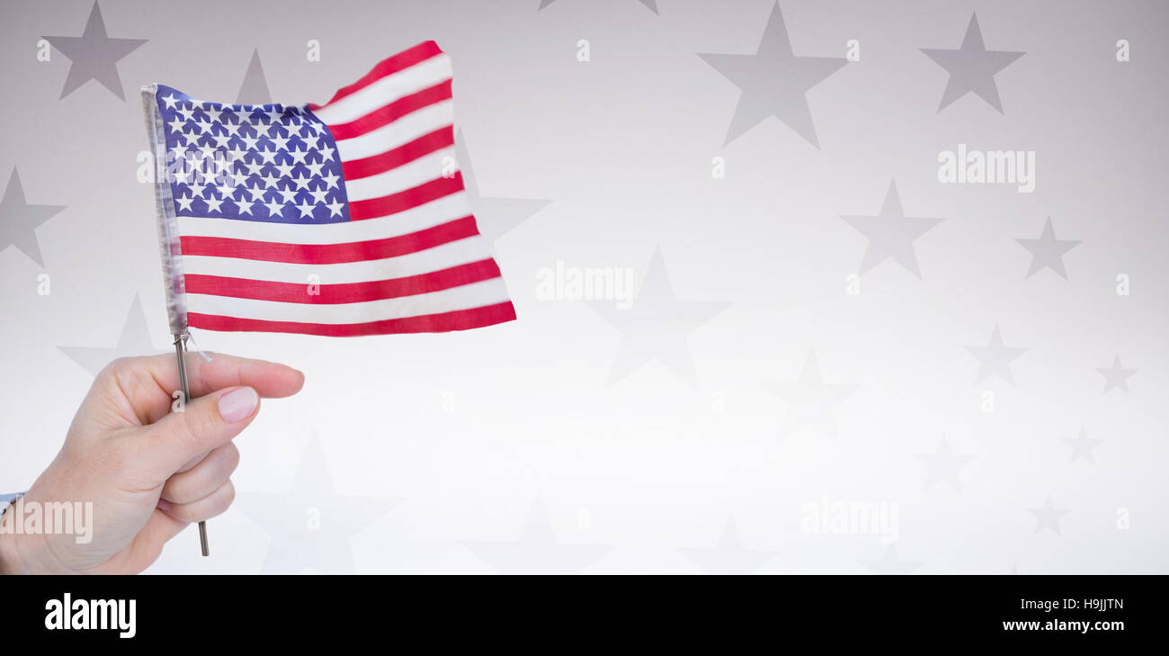 Digital image of hand holding American flag Stock Photo - Alamy
