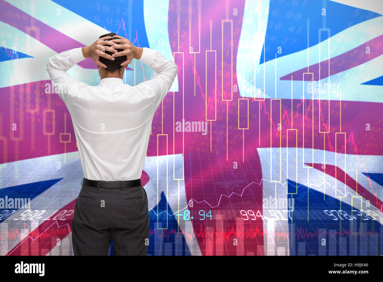 Composite image of businessman standing back to camera hands on head ...