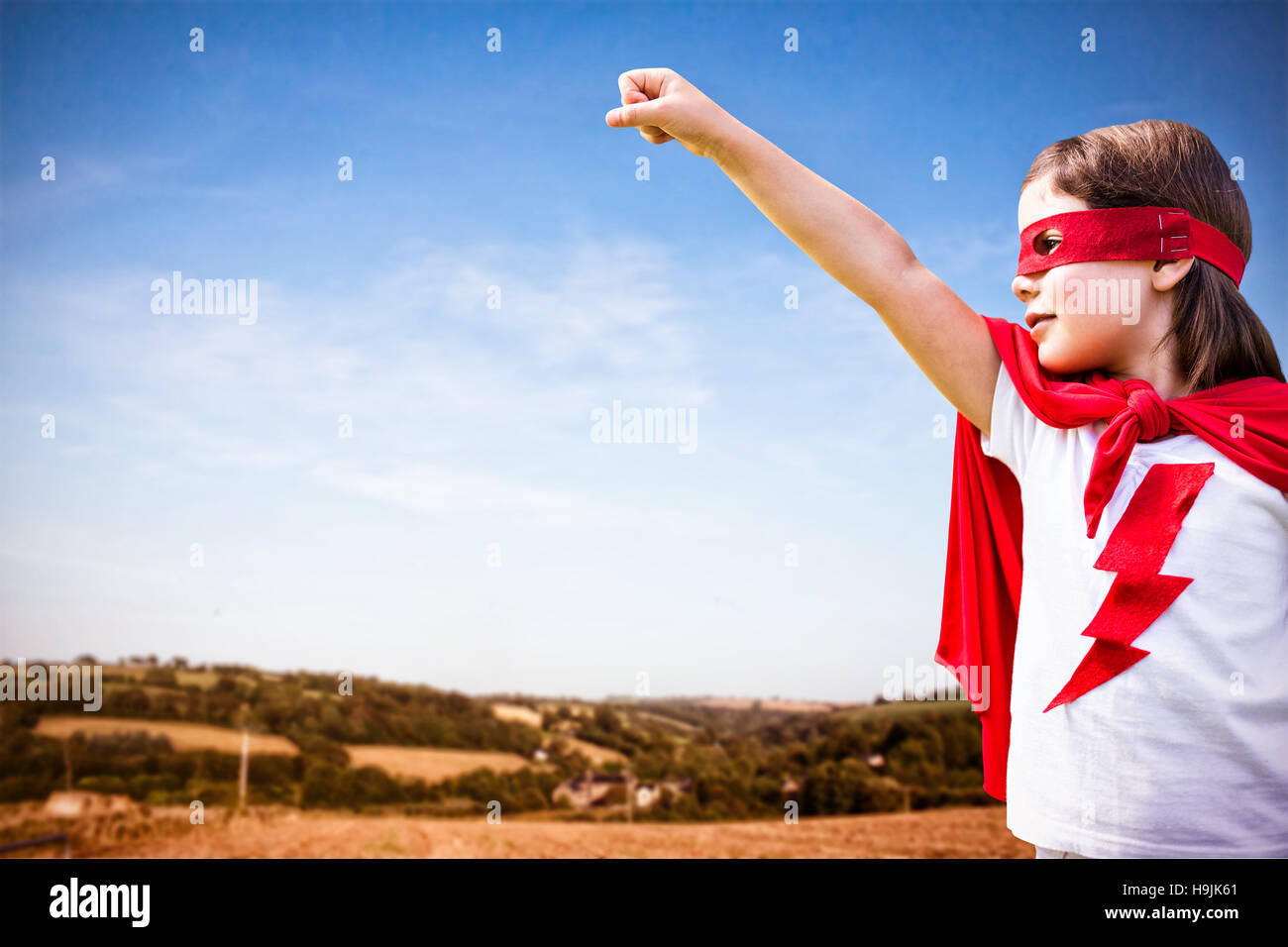 Girl in red cape hi-res stock photography and images - Alamy
