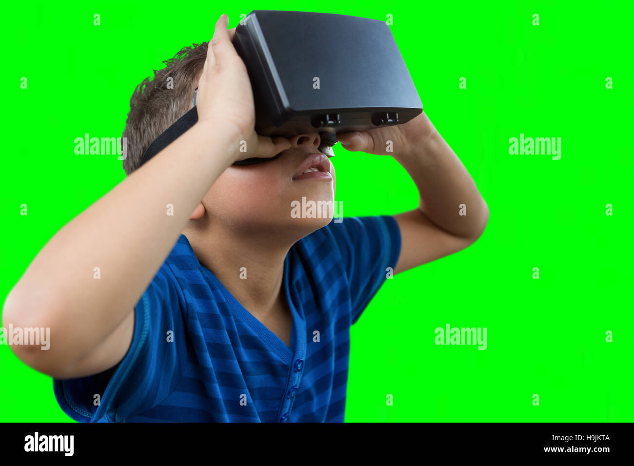 Children with green glasses hi-res stock photography and images - Alamy