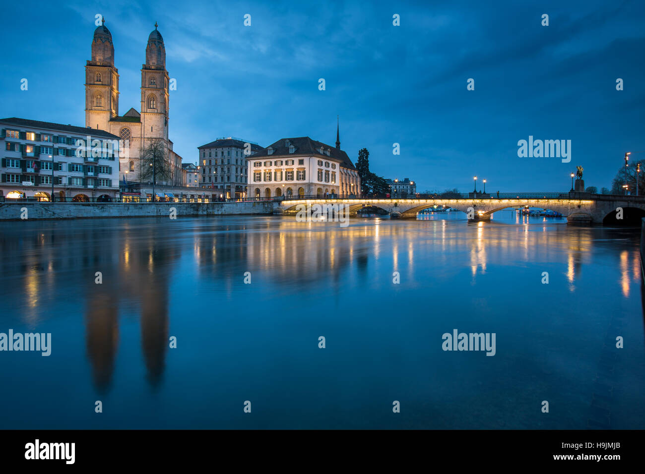 Zurich, Switzerland - night view with Grossmunster church Stock Photo ...