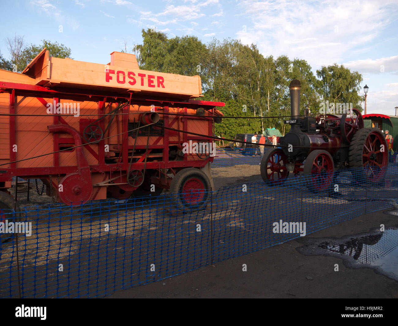 Foster threshing machine being powered by a vintage traction engine at ...