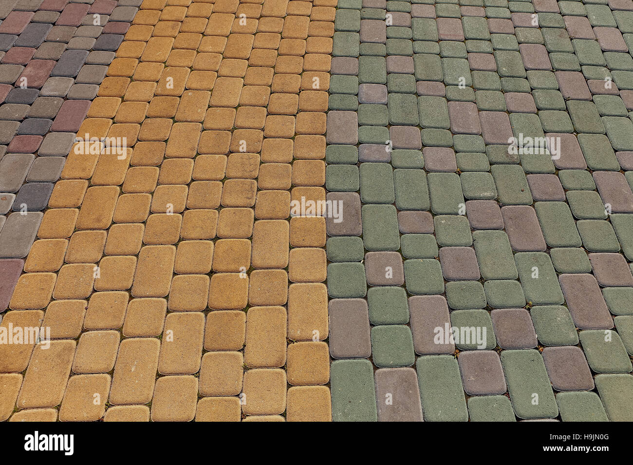 Colored stone paving texture and background Stock Photo - Alamy