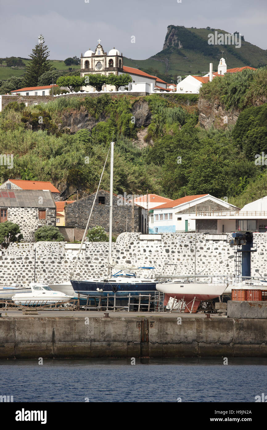 Azores landscape in Lajes das Flores with sailboats and church ...