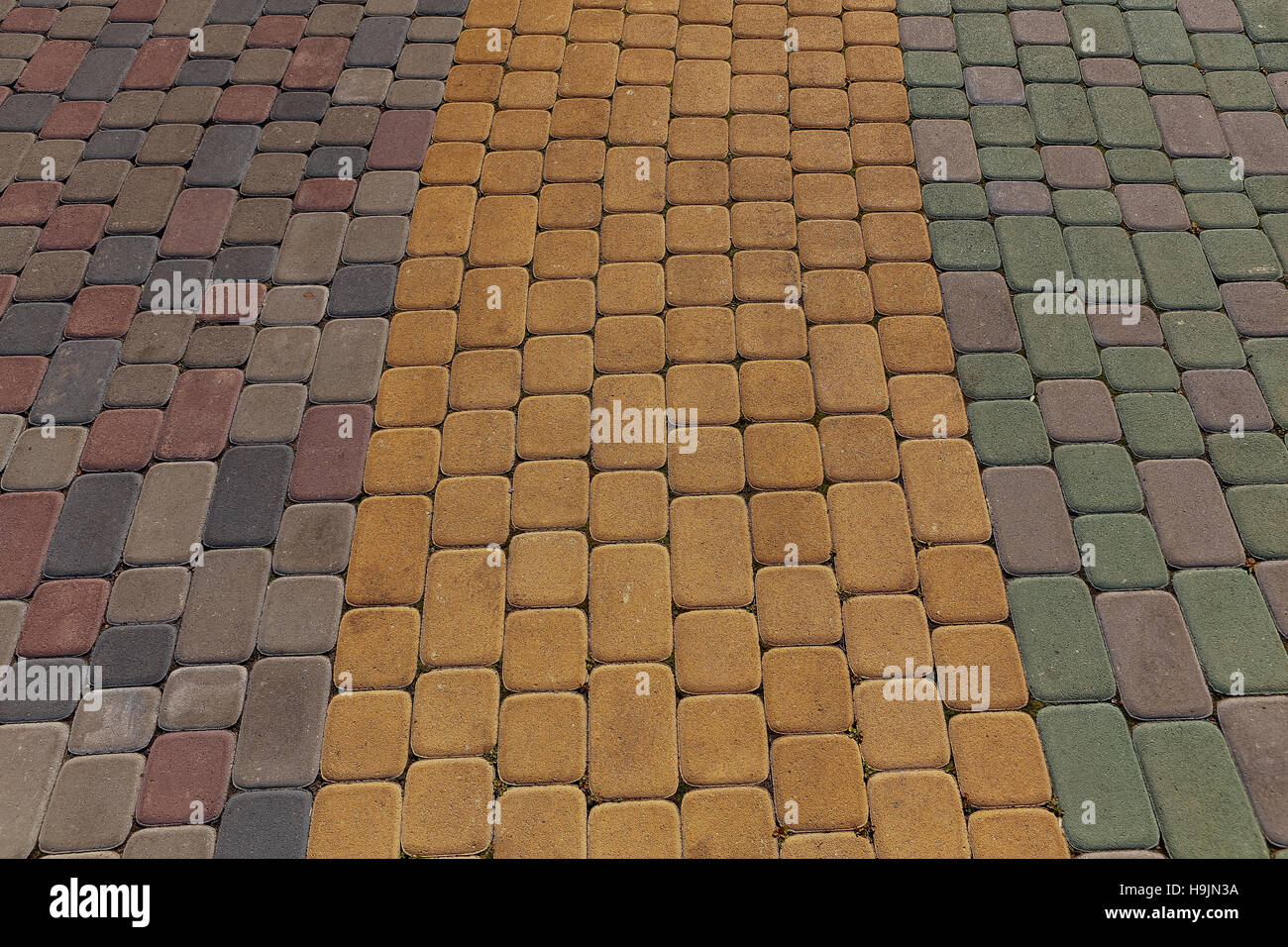 Colored stone paving texture and background Stock Photo - Alamy