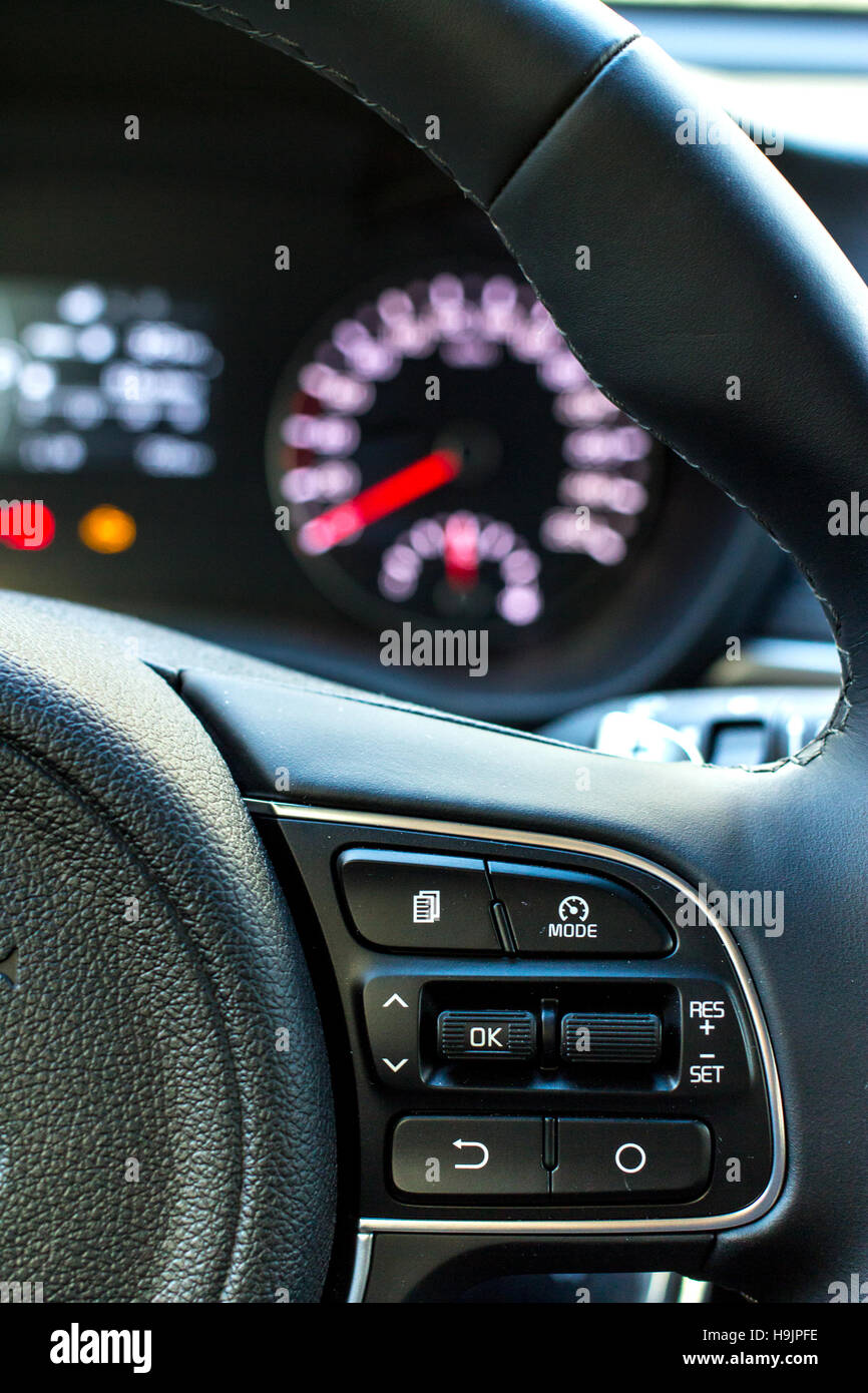 Car audio control buttons on steering wheel. Selective focus Stock ...