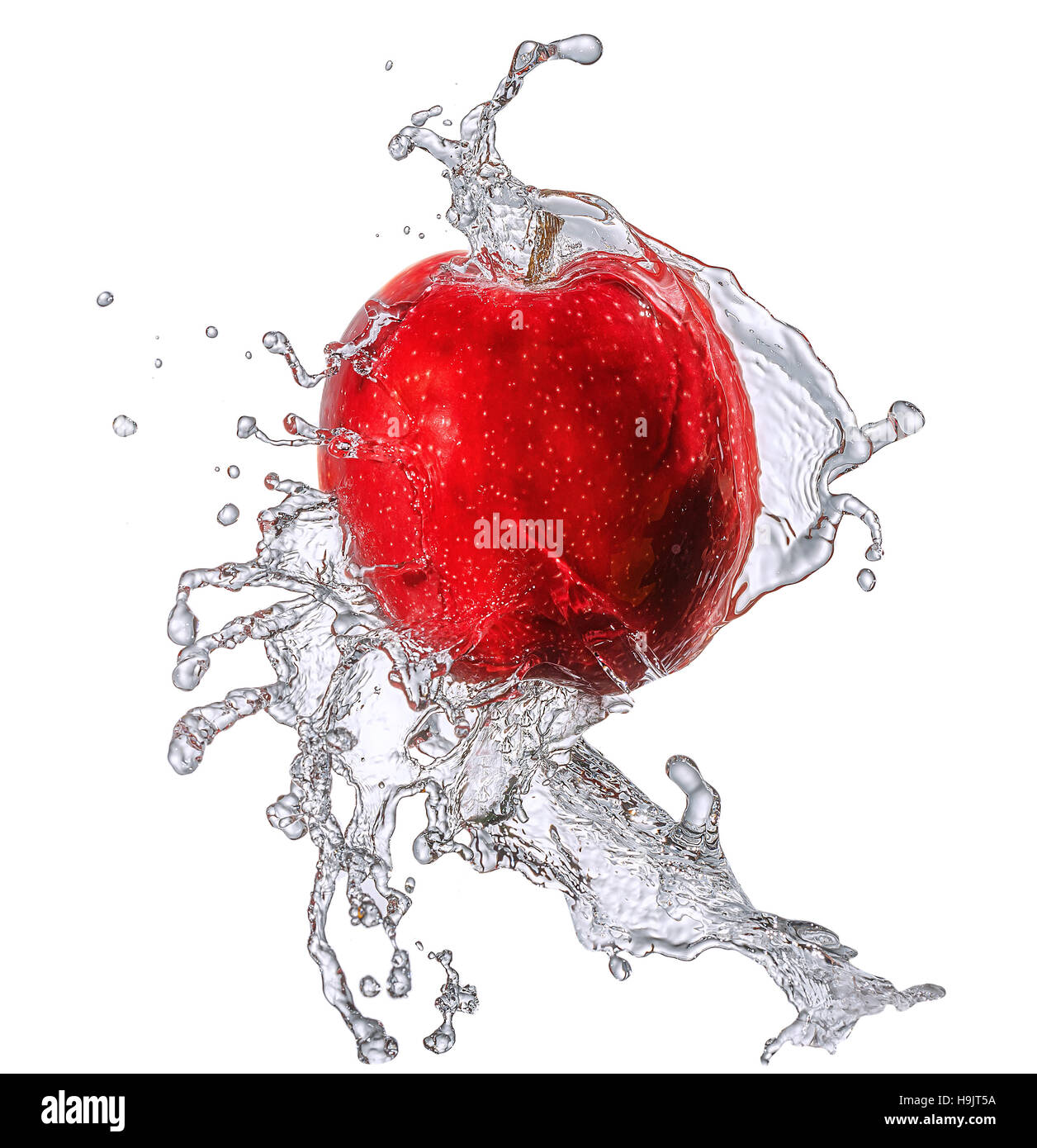 Water splash with apple isolated Stock Photo - Alamy