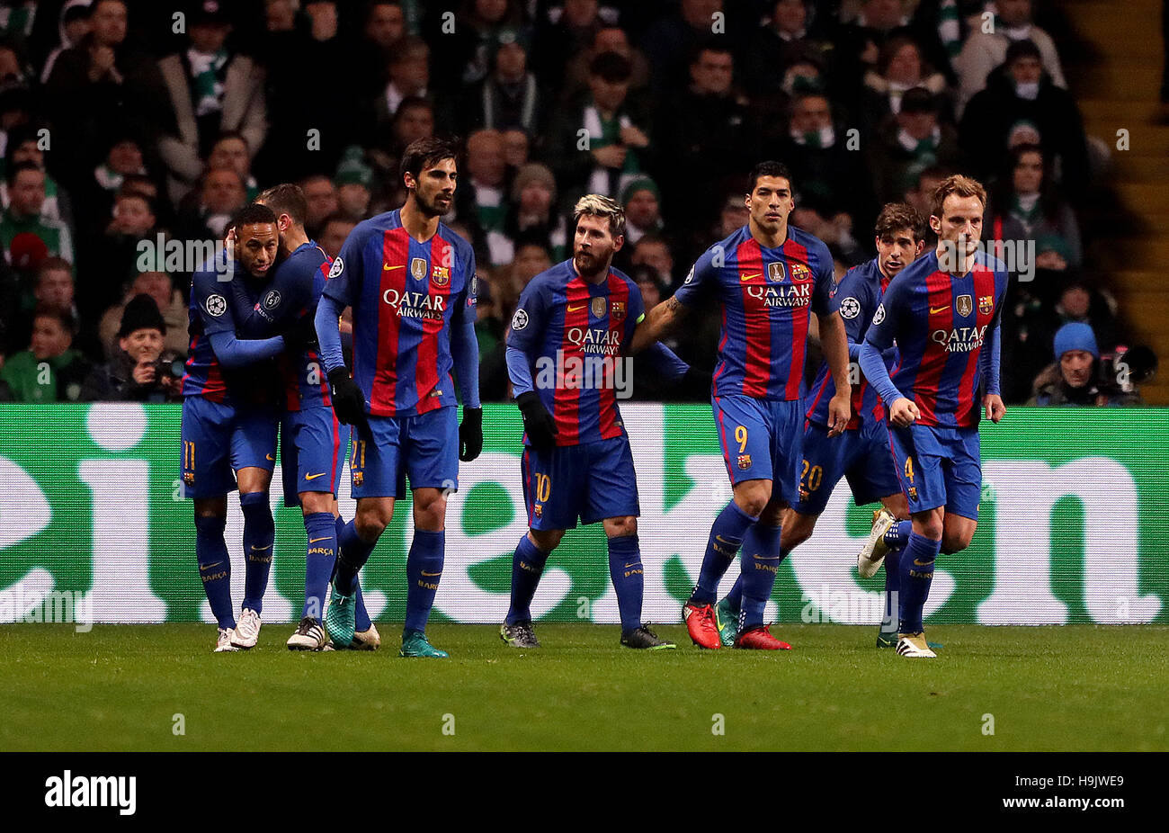 Barcelona's Lionel Messi (centre) celebrates scoring his side's first ...