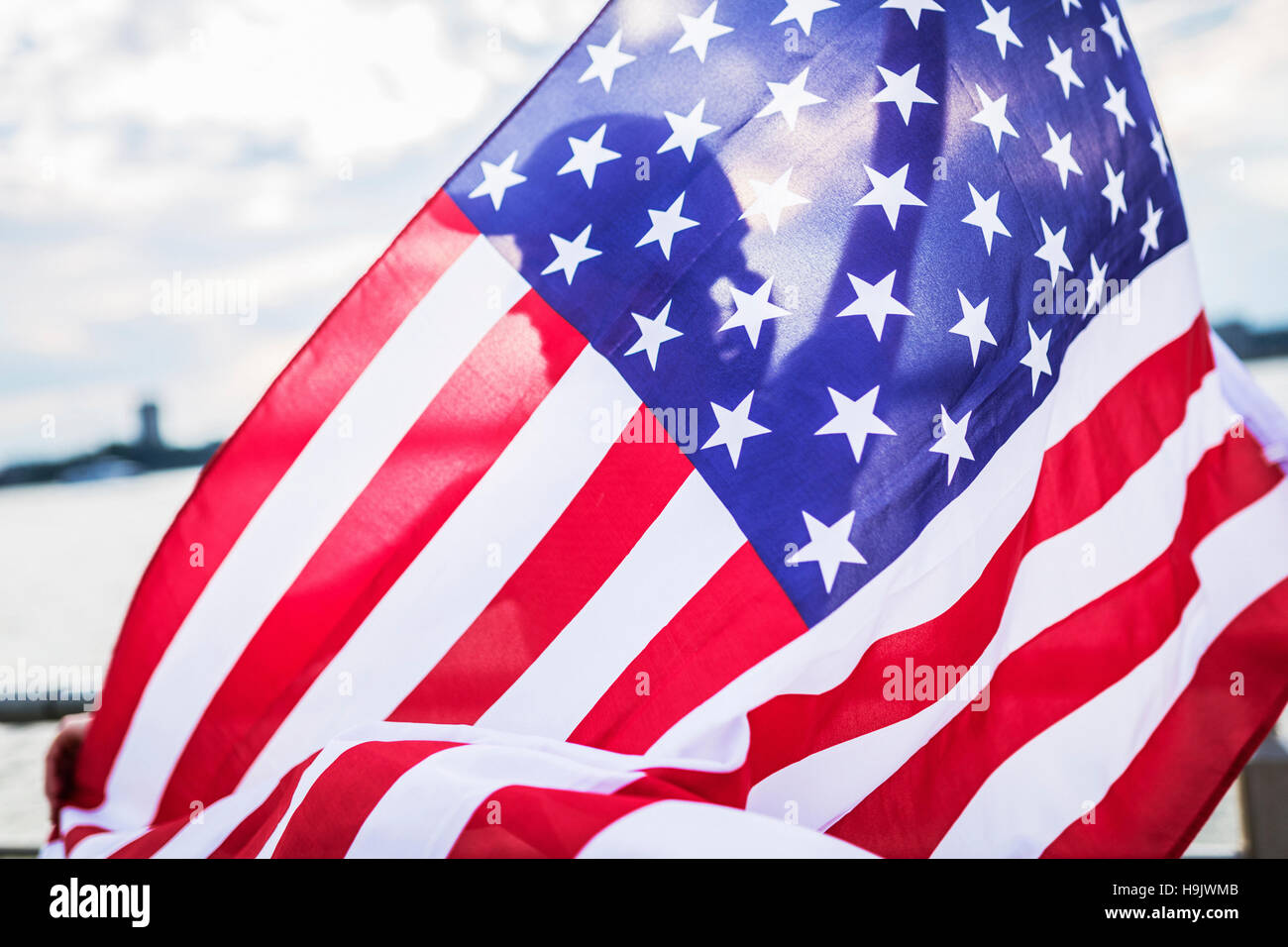 Shadow behind flag hi-res stock photography and images - Alamy